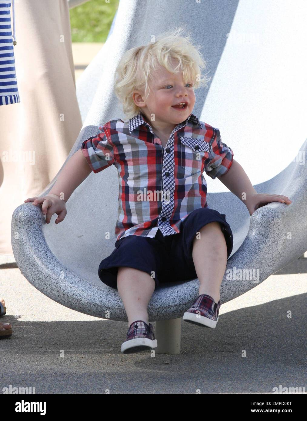 Amadeus Becker and mom Lily visit a kid's playground by the ocean where ...