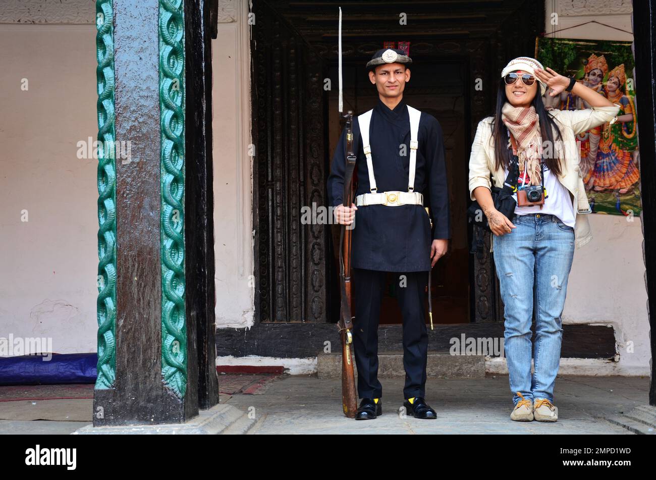 Traveler thai women journey and travel visit portrait posing with security guard nepalese people ...