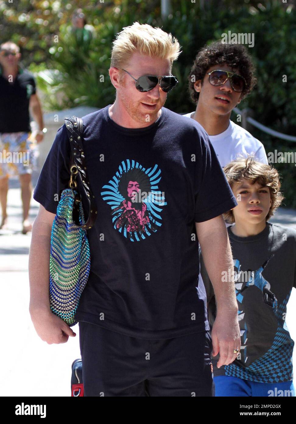 Boris Becker takes his growing family for a stroll on the boardwalk in ...