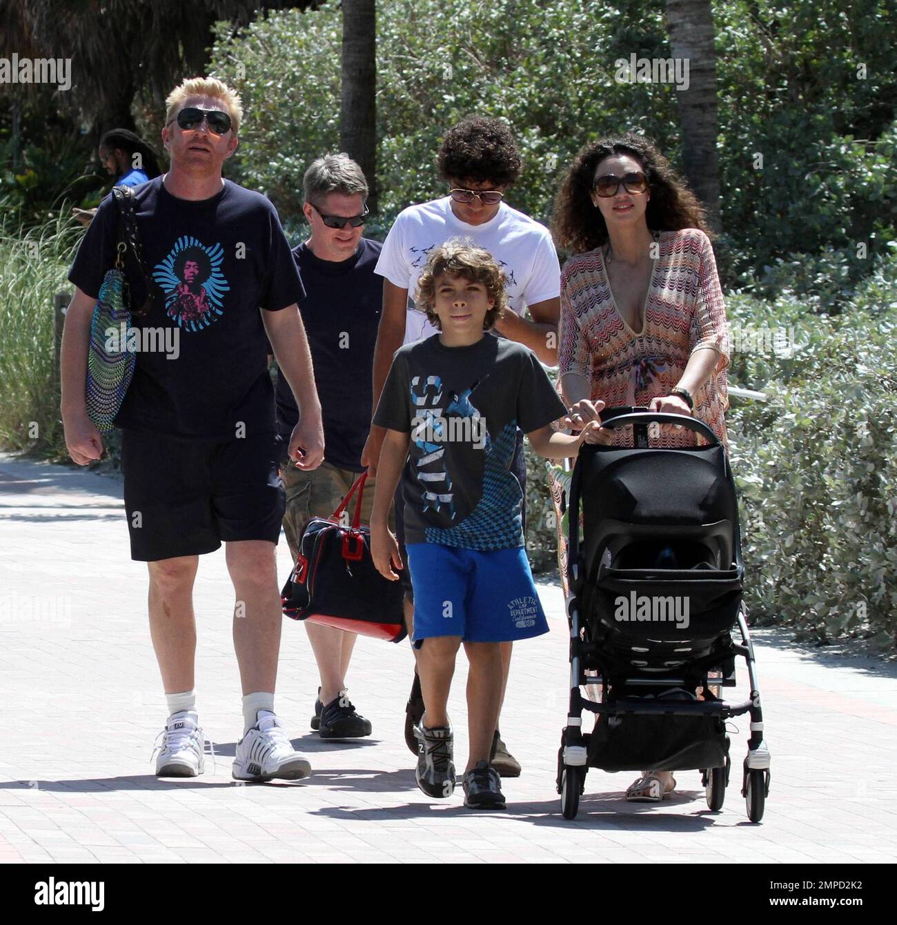 Boris Becker takes his growing family for a stroll on the boardwalk in ...