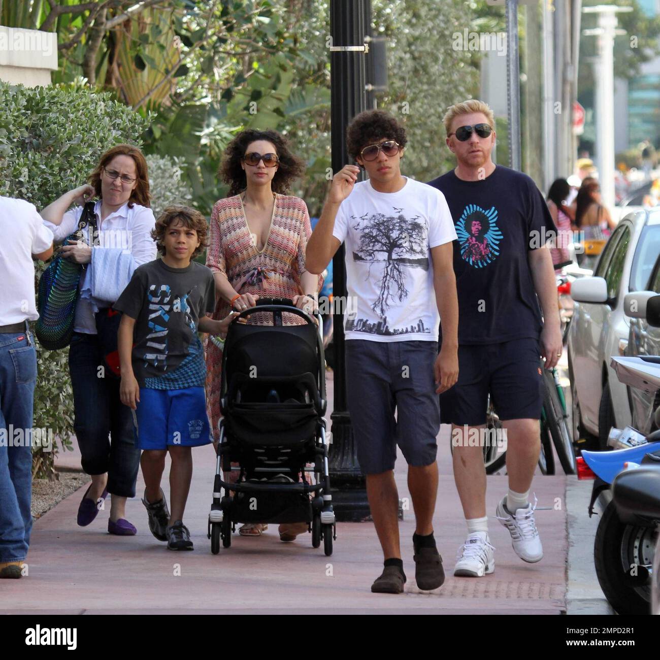 Boris Becker takes his growing family for a stroll on the boardwalk in ...