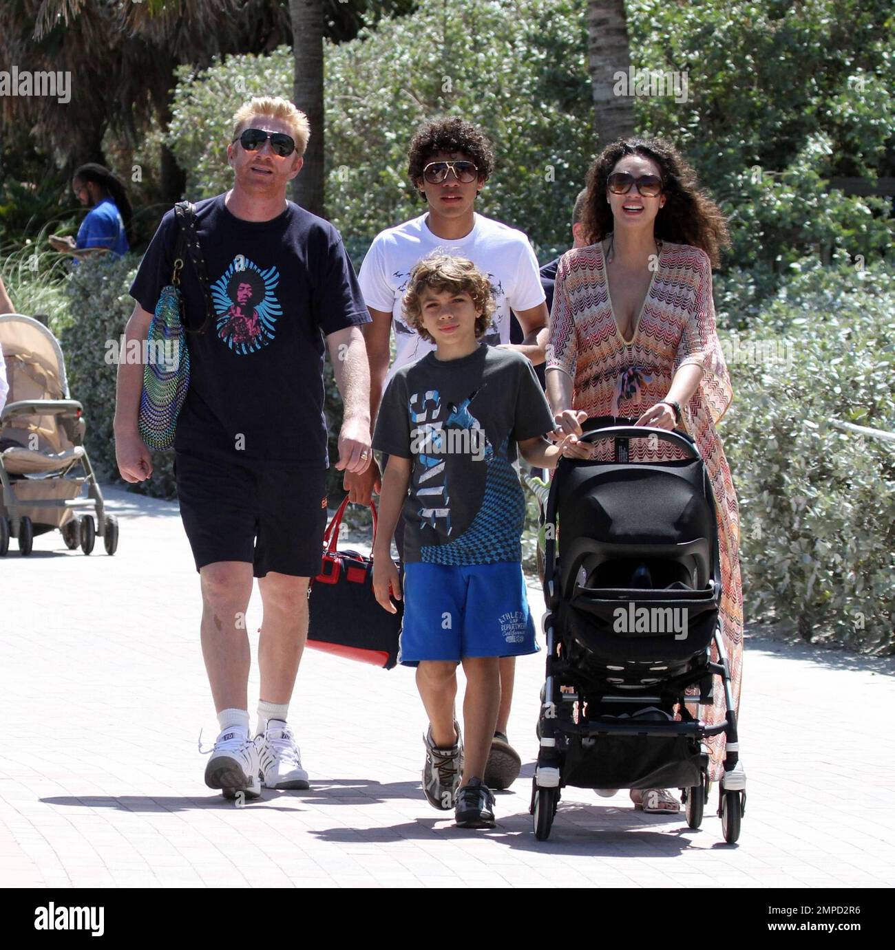 Boris Becker takes his growing family for a stroll on the boardwalk in ...