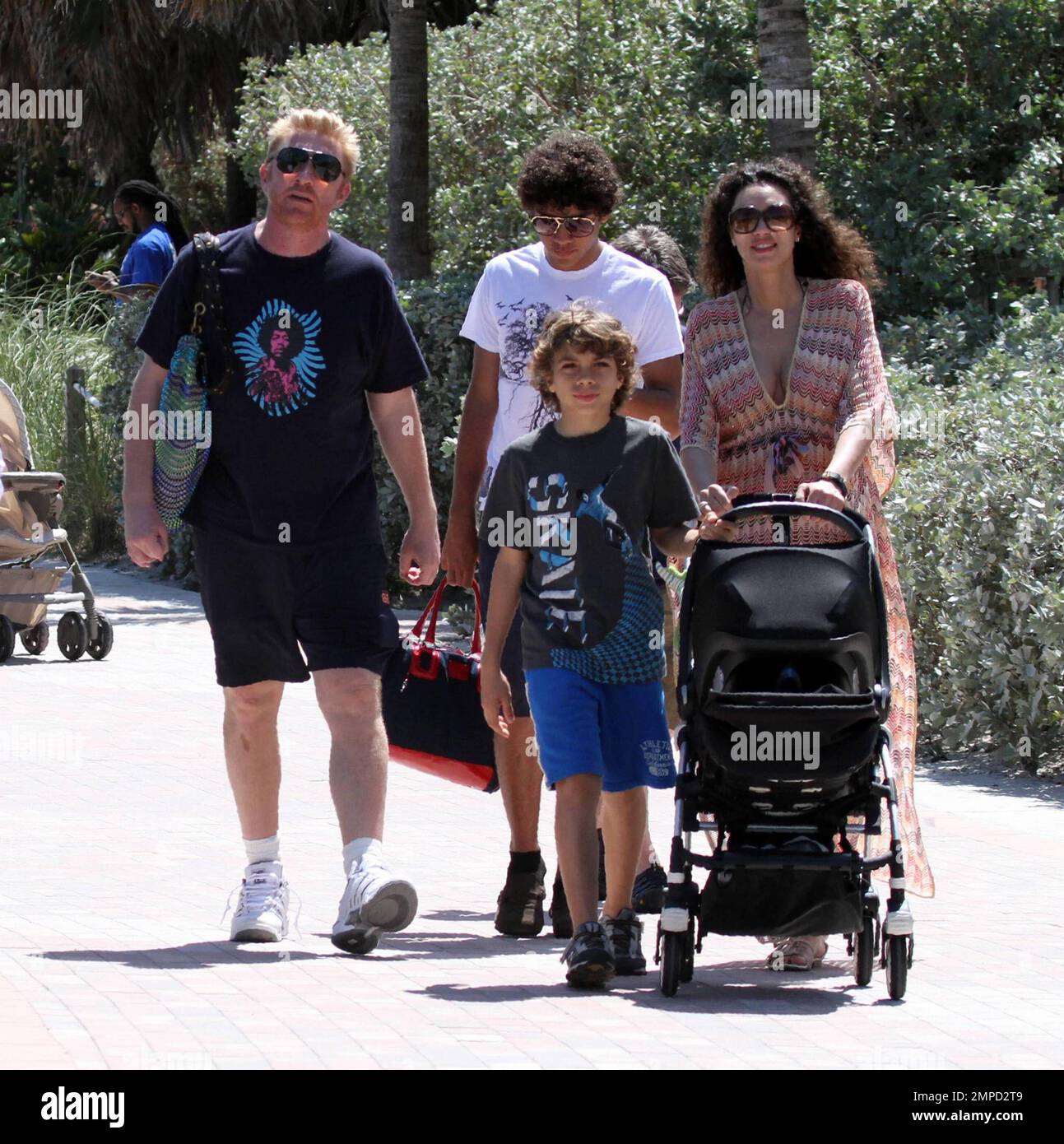 Boris Becker takes his growing family for a stroll on the boardwalk in ...