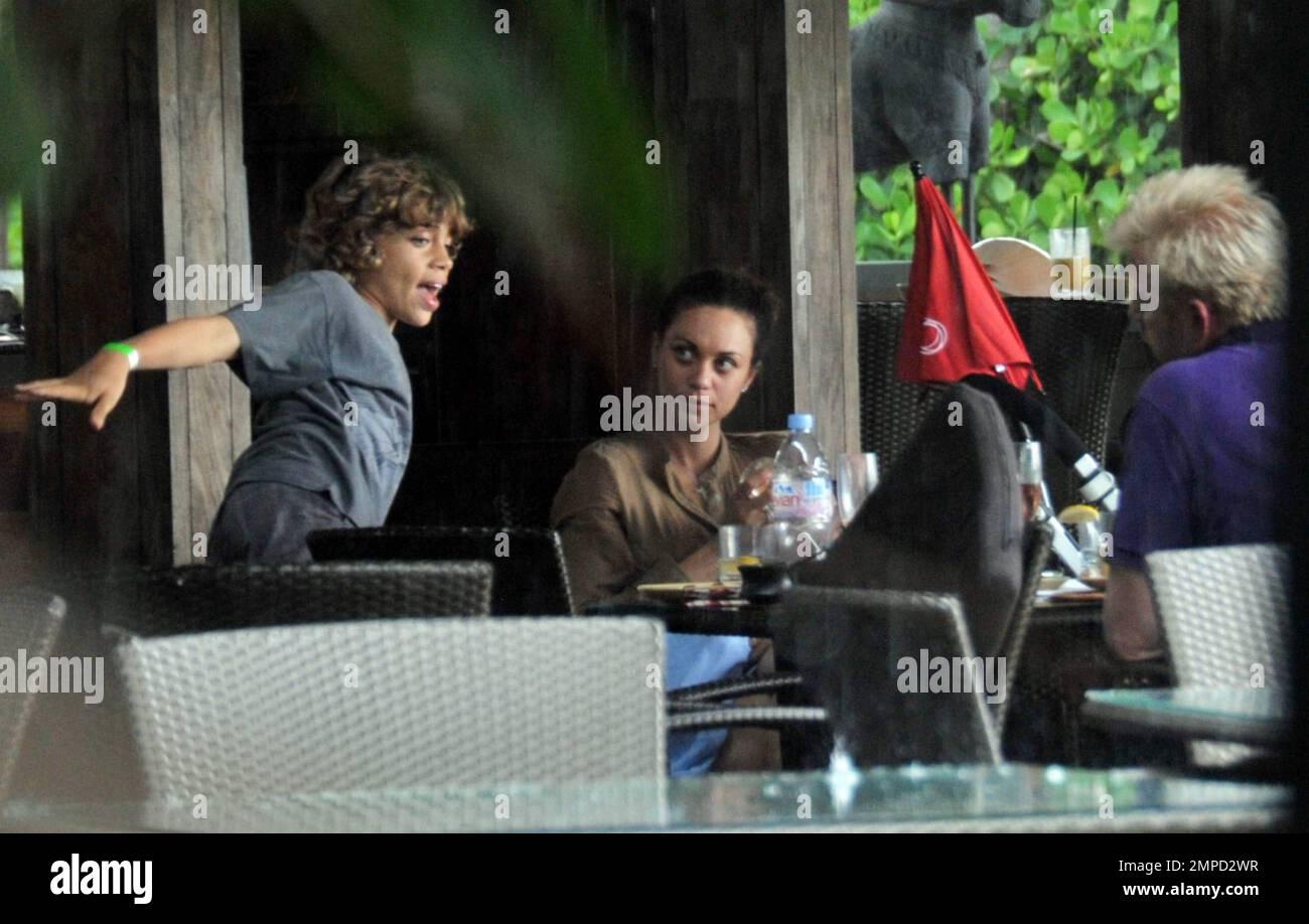 Boris Becker takes a walk in the rain with his wife Sharlely, son Elias ...