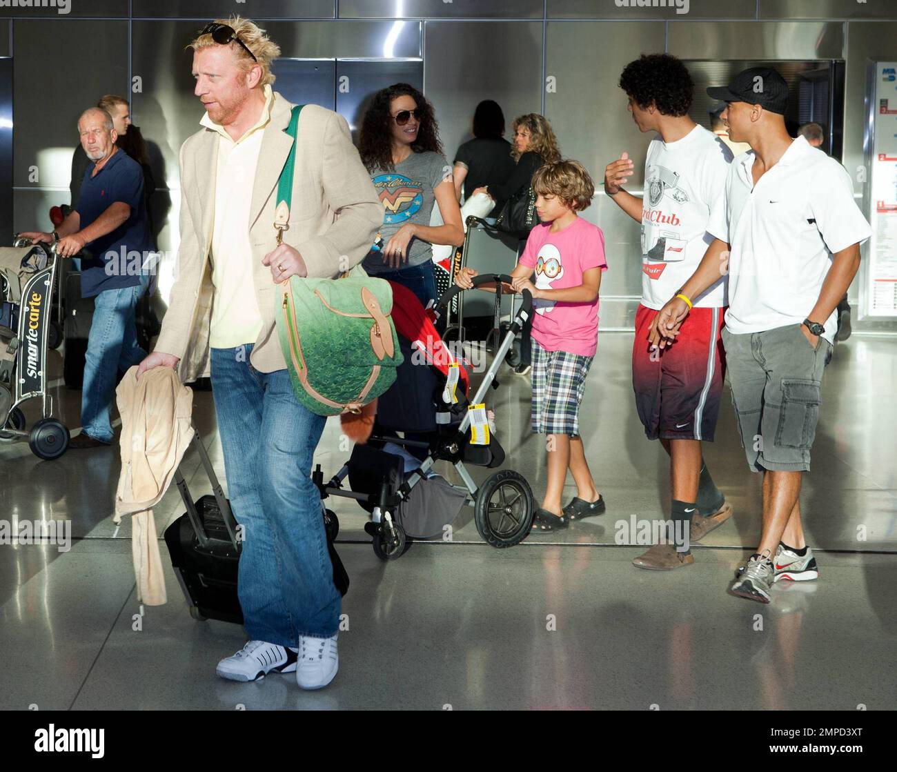 Boris Becker arrives at Miami International Airport with wife Lilly and ...