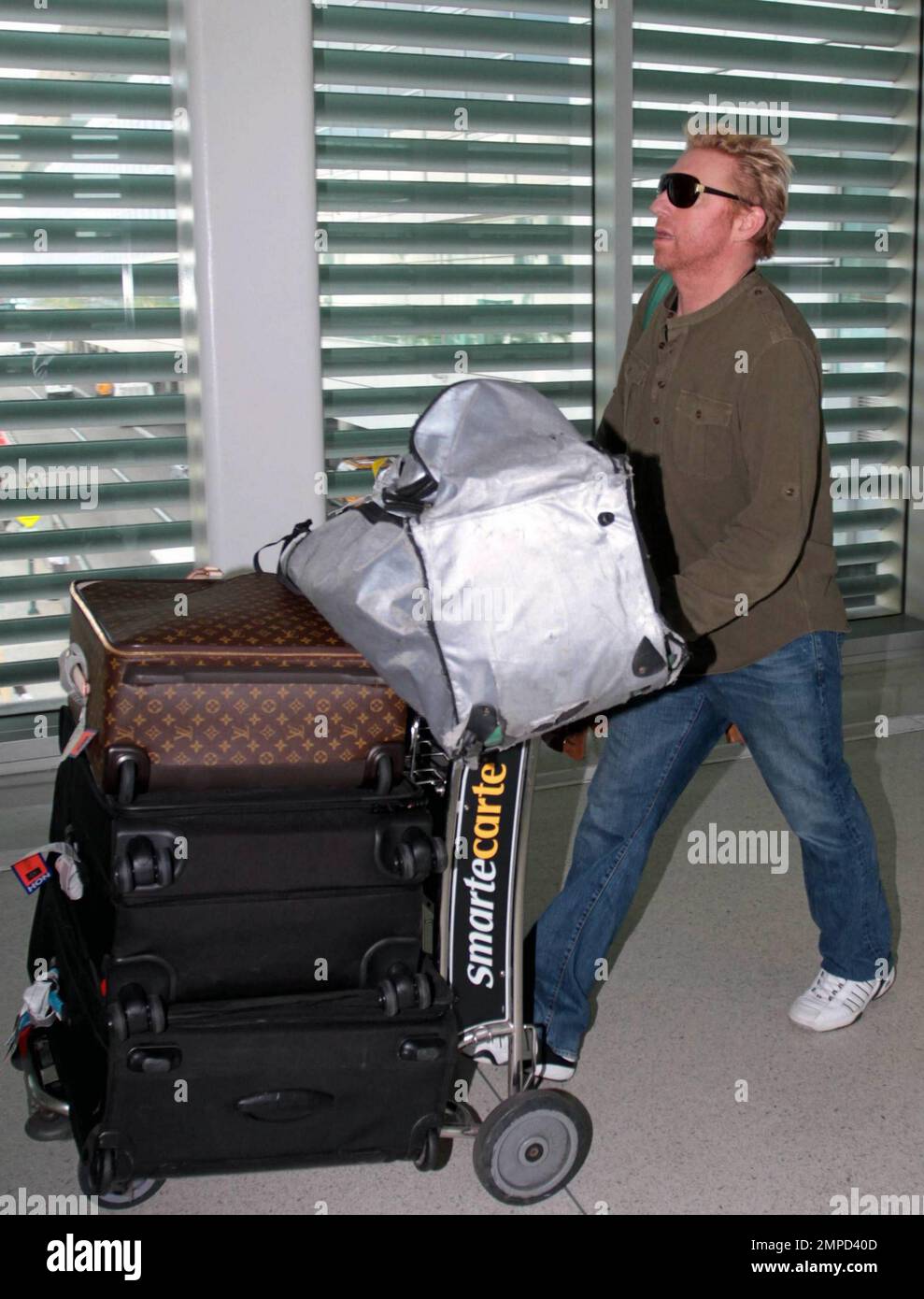 Tennis legend Boris Becker, wife Sharlely and son Amadeus arrive at ...