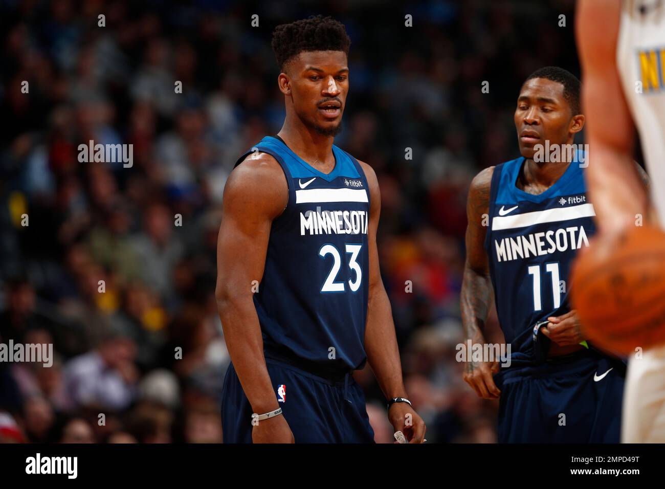 Minnesota Timberwolves guard Jimmy Butler (23) and Minnesota ...