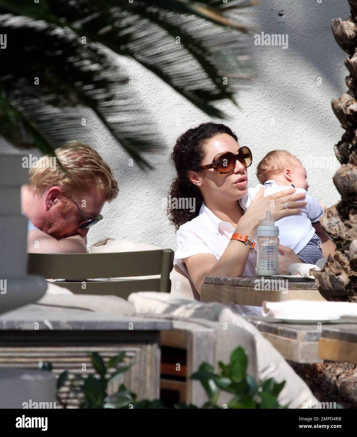 Tennis ace Boris Becker walks along Miami Beach boardwalk yawning and ...