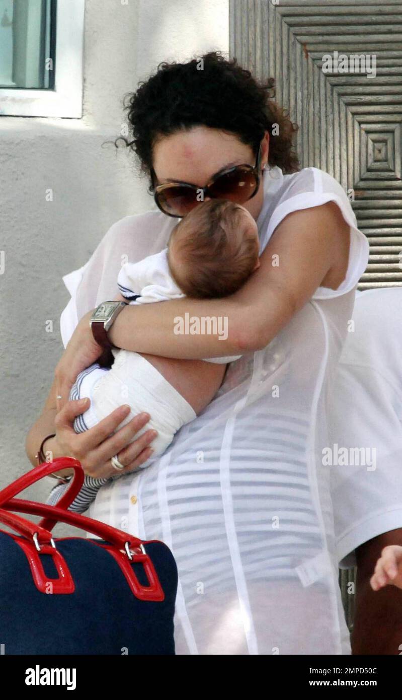 Tennis ace Boris Becker walks along Miami Beach boardwalk yawning and ...