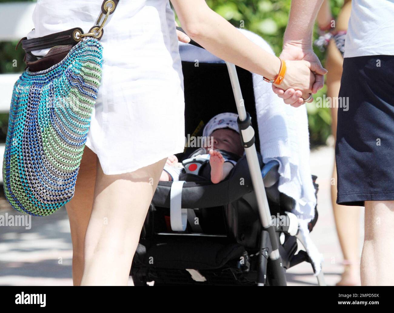 Tennis ace Boris Becker walks along Miami Beach boardwalk yawning and ...