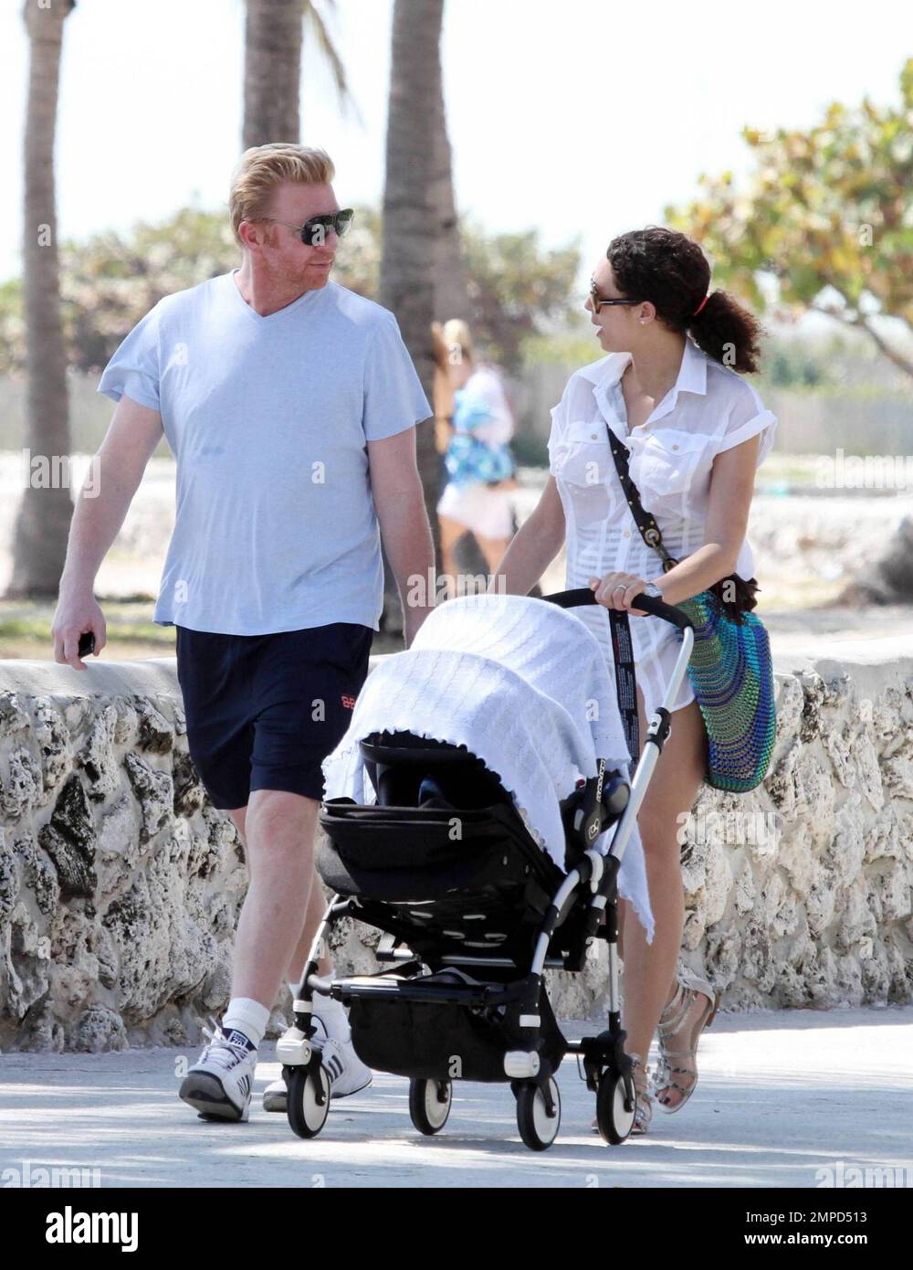 Tennis ace Boris Becker walks along Miami Beach boardwalk yawning and ...