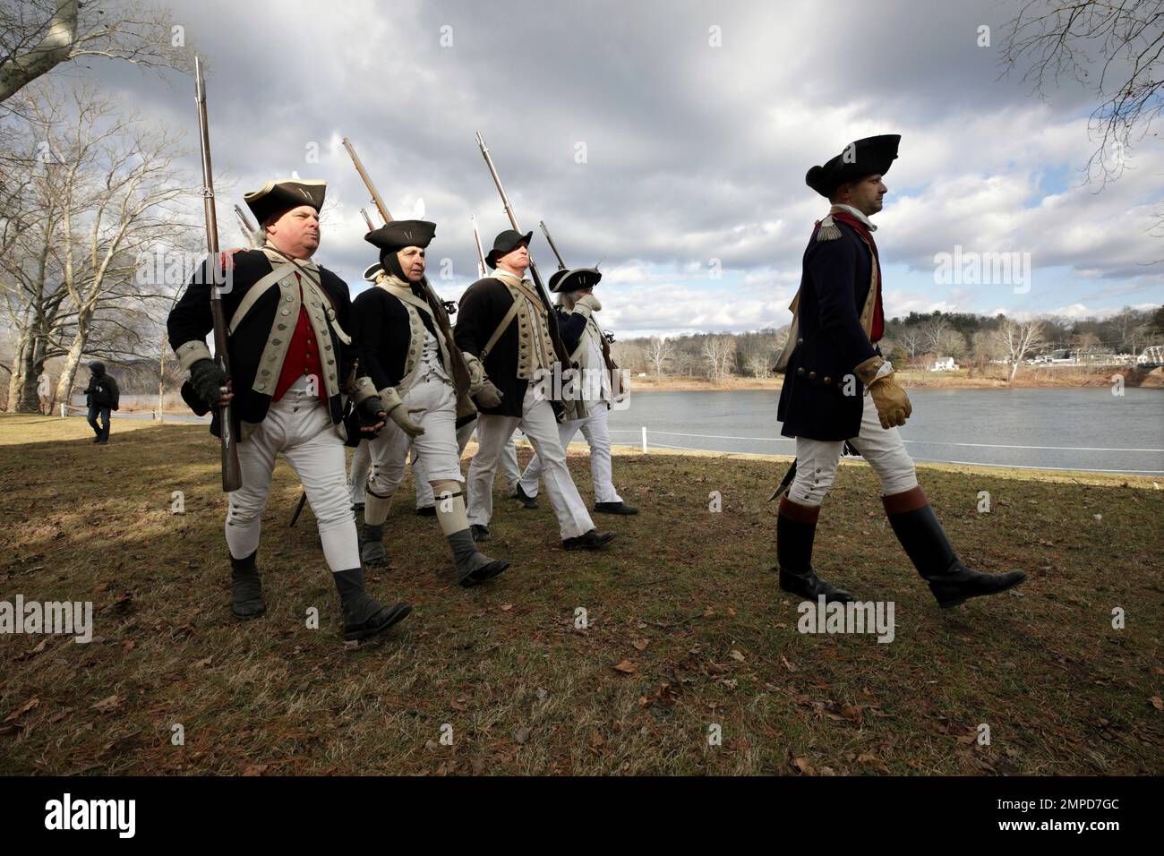 Troops march during a re-enactment of Gen. George Washington's daring ...