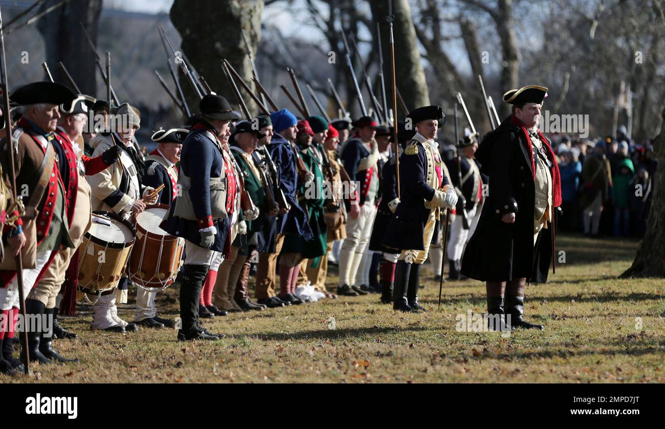 Troops march during a re-enactment of Gen. George Washington's daring ...