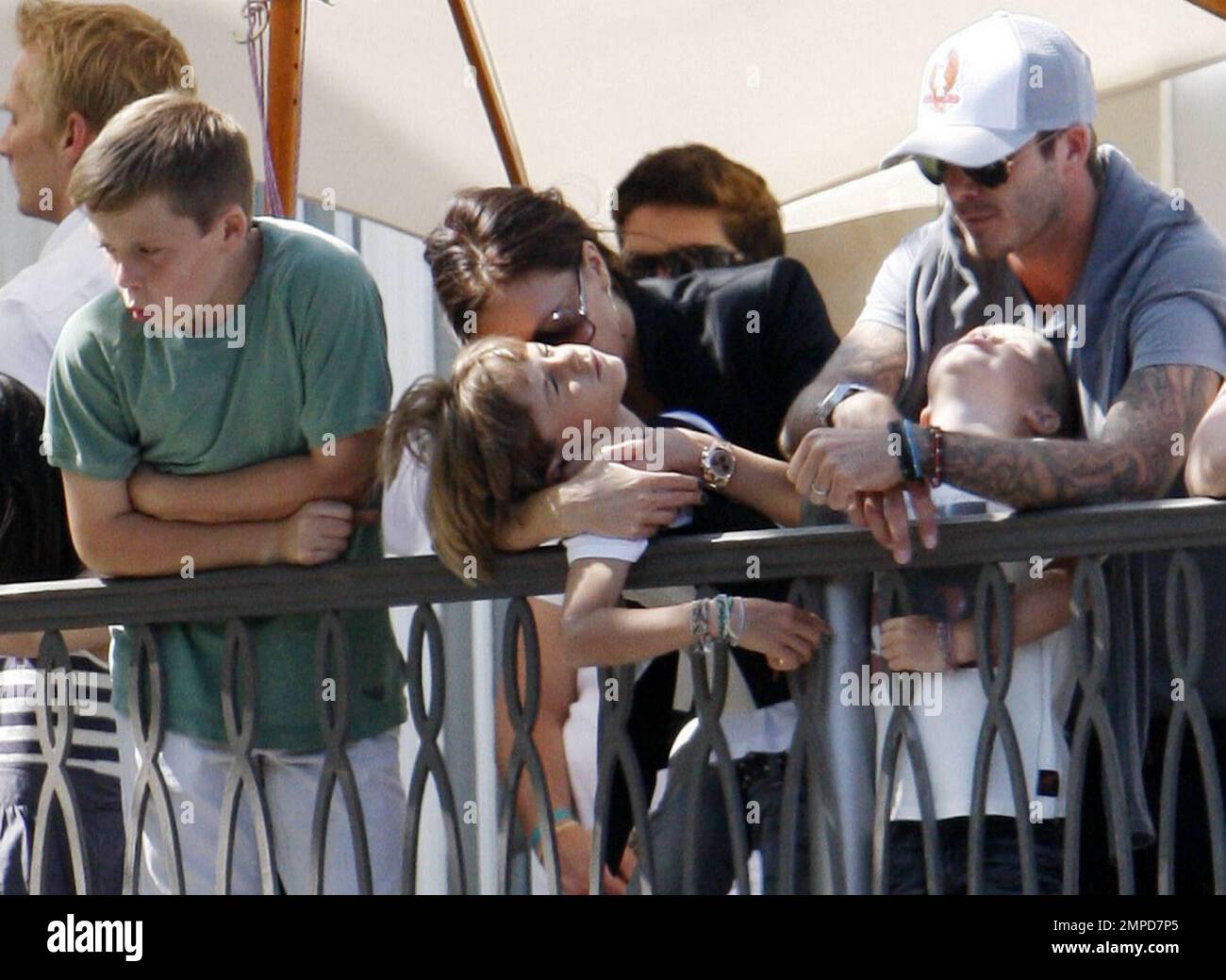 Footballer David Beckham, wife Victoria and their three sons Brooklyn ...