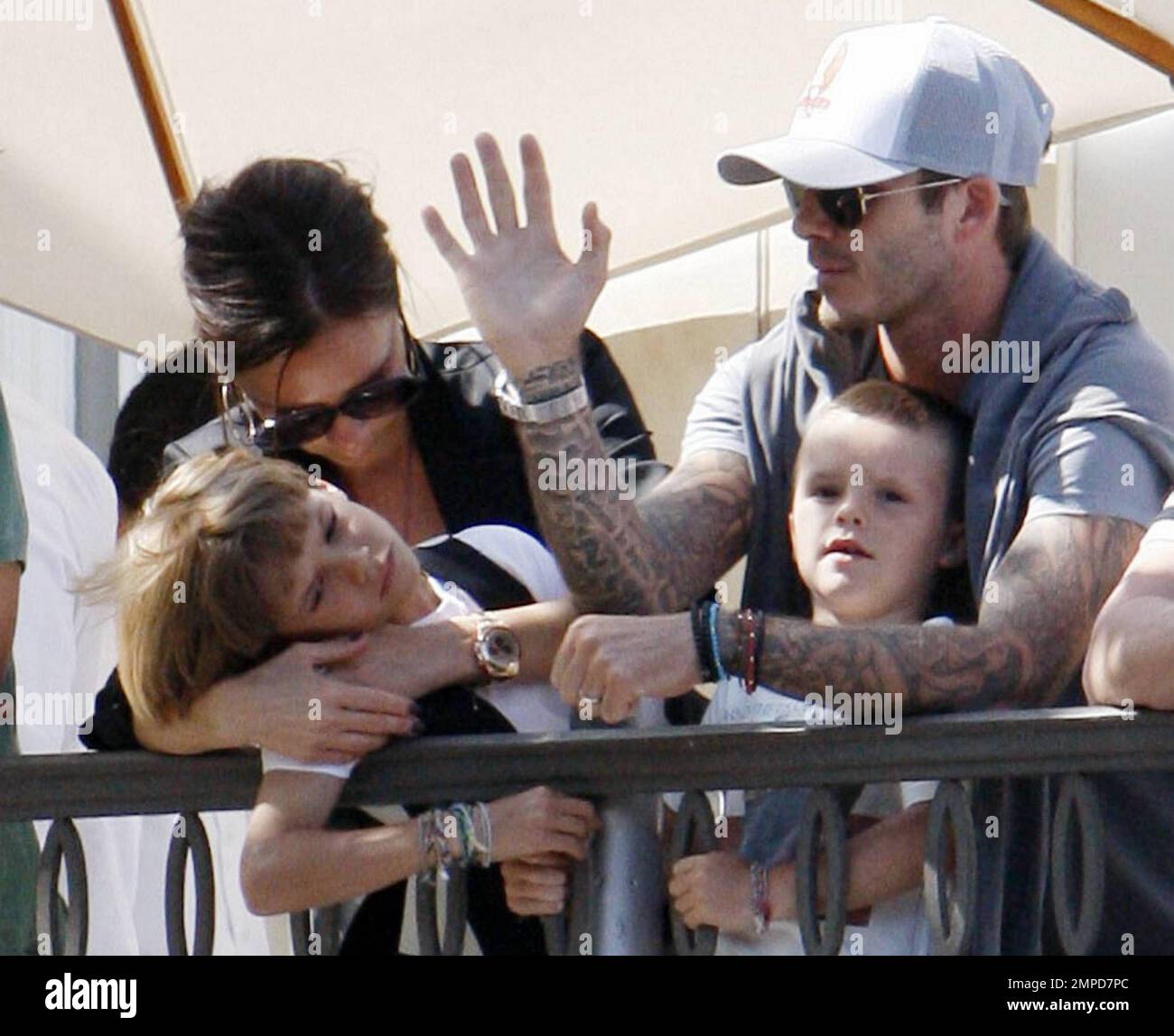 Footballer David Beckham, wife Victoria and their three sons Brooklyn ...