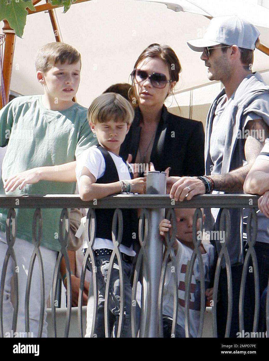 Footballer David Beckham, wife Victoria and their three sons Brooklyn ...