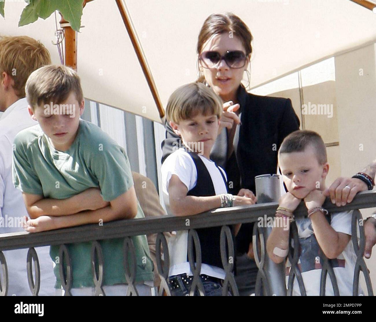 Footballer David Beckham, wife Victoria and their three sons Brooklyn ...