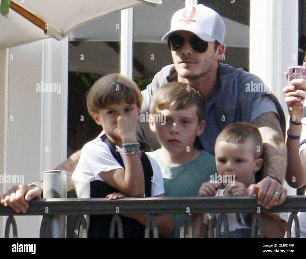Footballer David Beckham, wife Victoria and their three sons Brooklyn ...