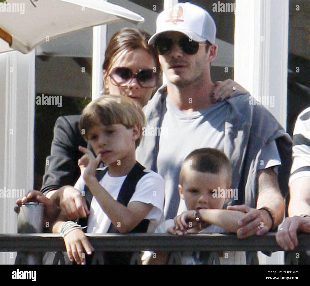Footballer David Beckham, wife Victoria and their three sons Brooklyn ...