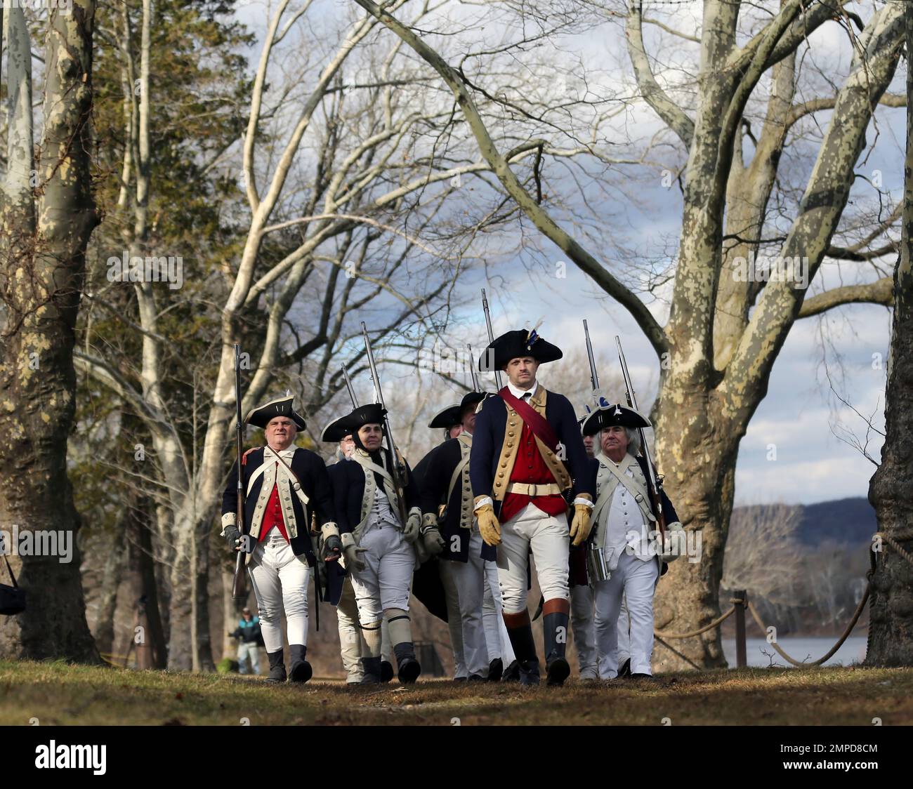Troops march during a re-enactment of Gen. George Washington's daring ...