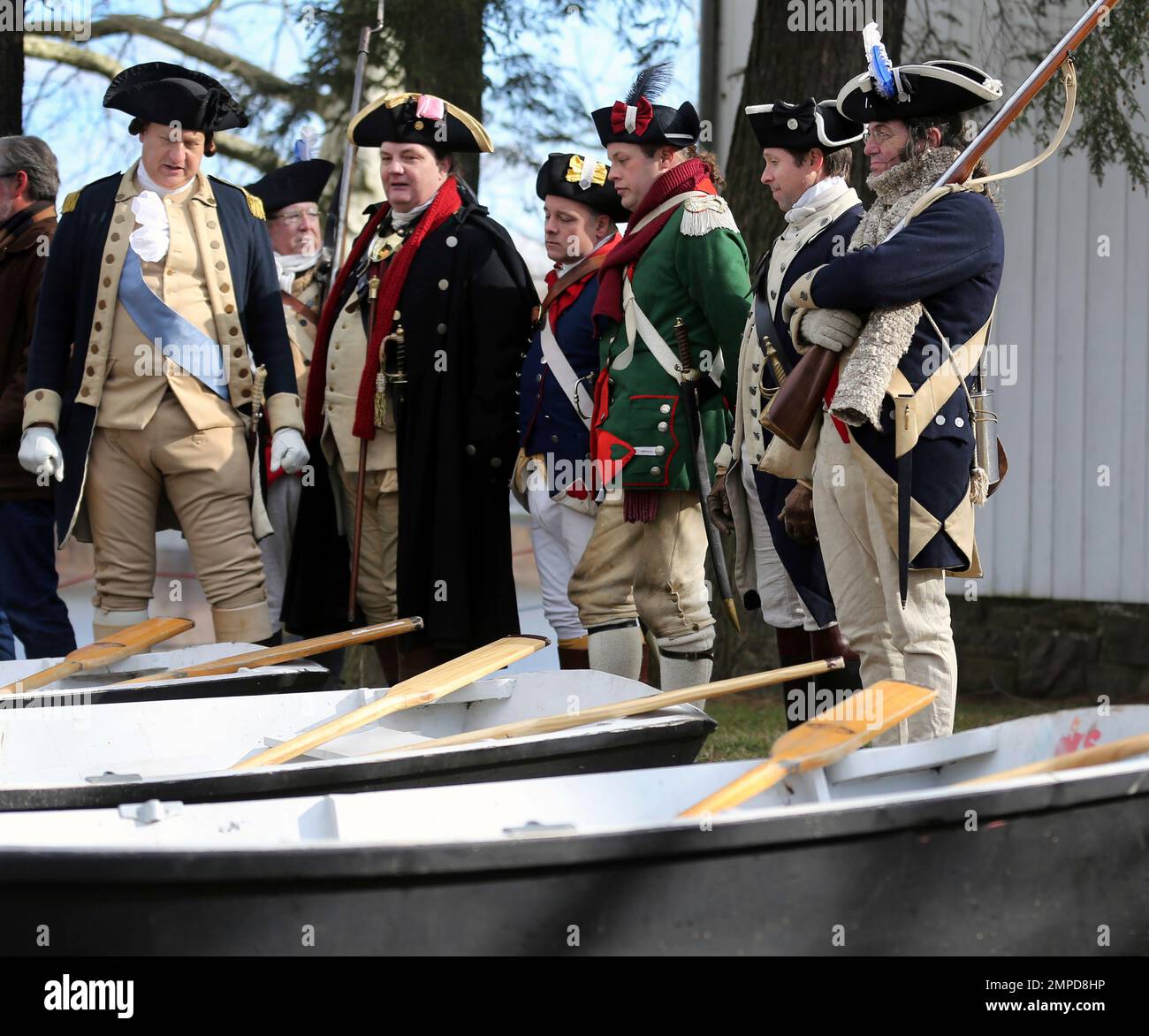 John Godzieba, as Gen. George Washington, left, stands with some of his ...