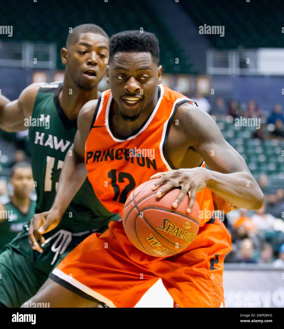 Princeton guard Myles Stephens, rights, attempts to work his way around ...