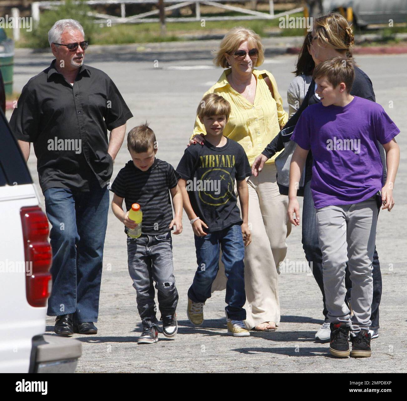 Victoria Beckham's mom and dad Tony and Jackie Adams are all smiles as ...