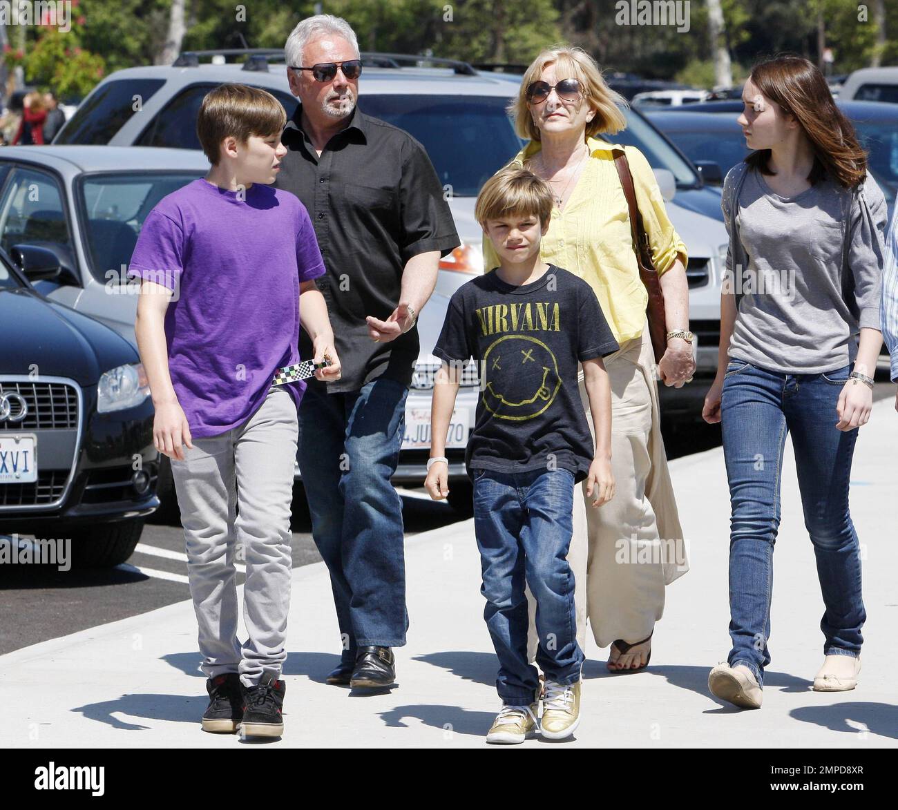 Victoria Beckham's mom and dad Tony and Jackie Adams are all smiles as ...