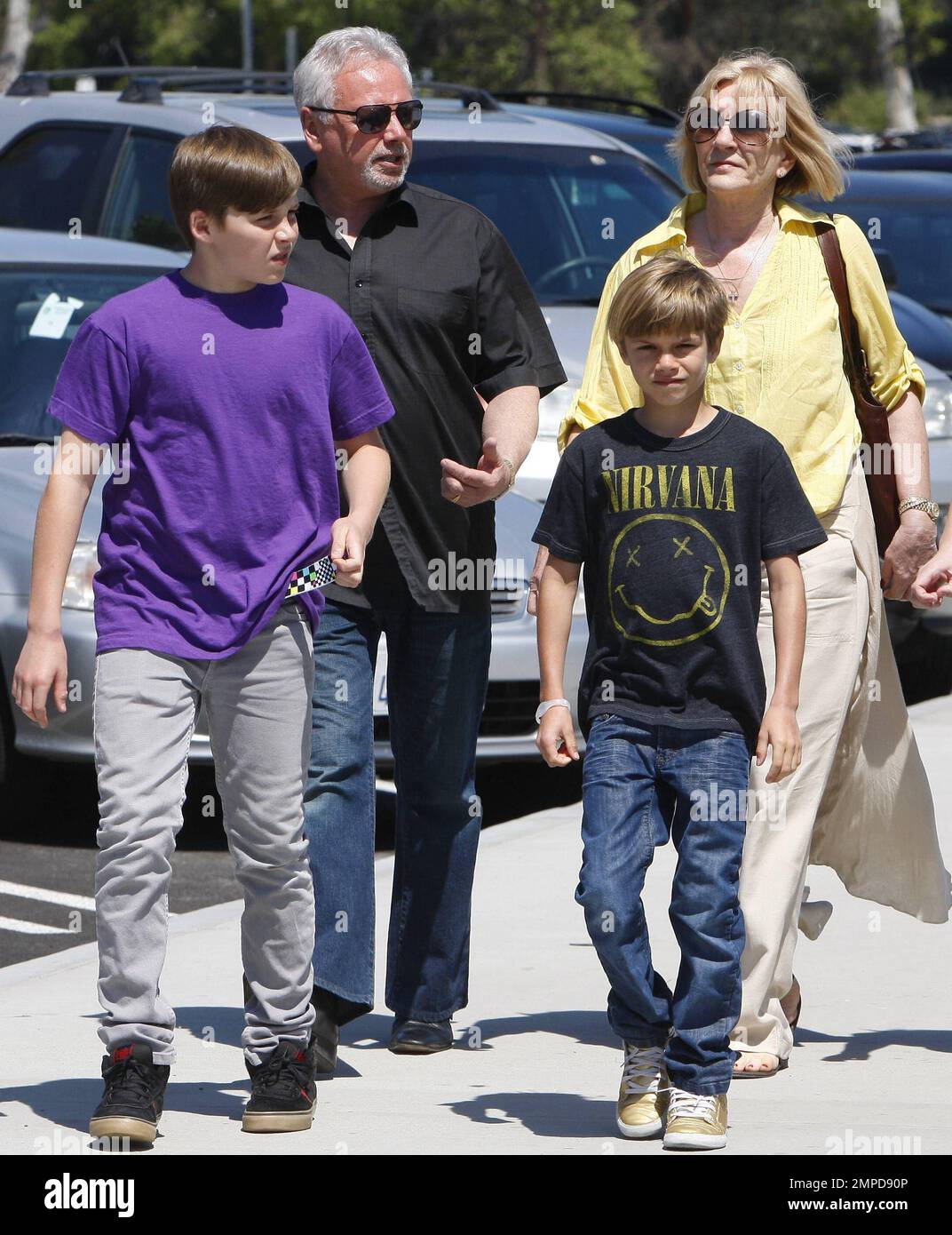Victoria Beckham's mom and dad Tony and Jackie Adams are all smiles as ...