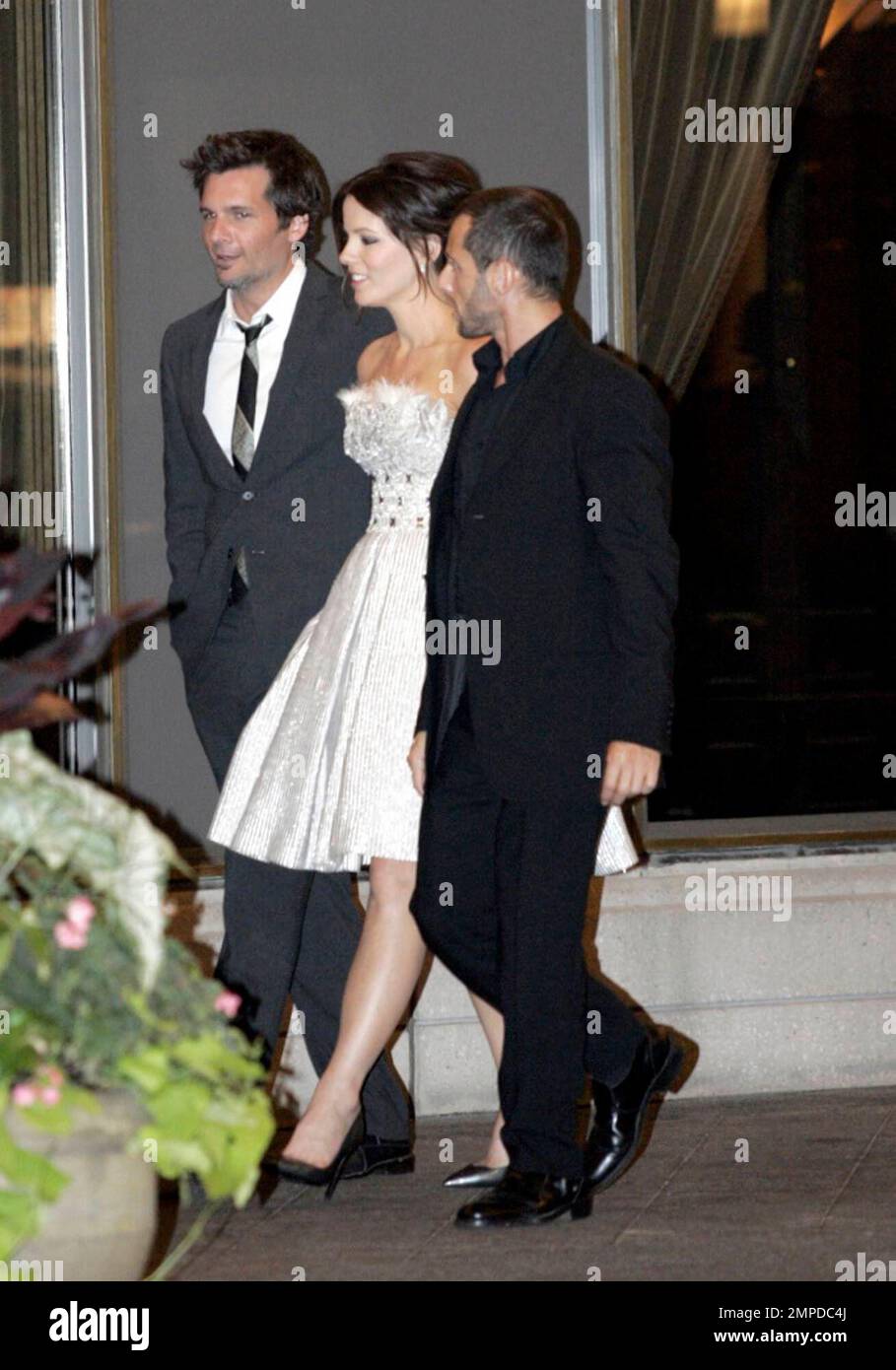 Colin Firth and Kate Beckinsale head into a Toronto hotel while in town ...