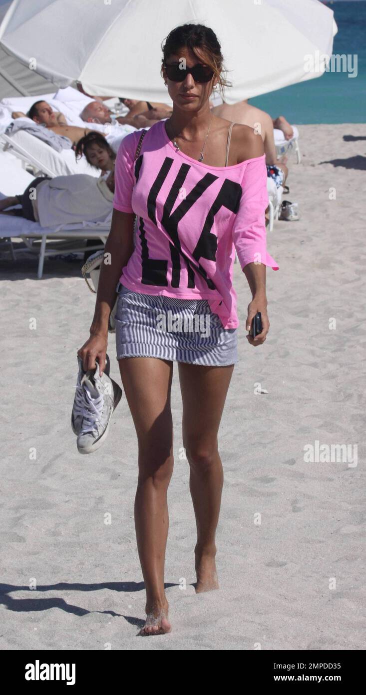 Bikini babe Belen Rodriguez flaunts her amazing figure as she relaxes ...