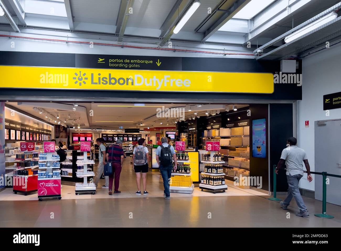 Passengers walking inside the International airport Stock Photo - Alamy