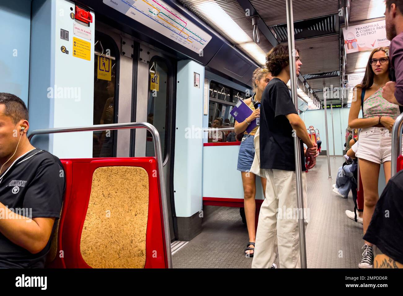 Passengers taking a ride in the metro Stock Photo - Alamy