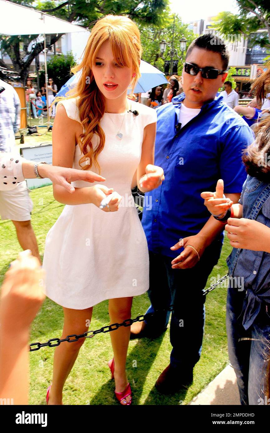 Disney star Bella Thorne signs autographs for fans during an appearance ...