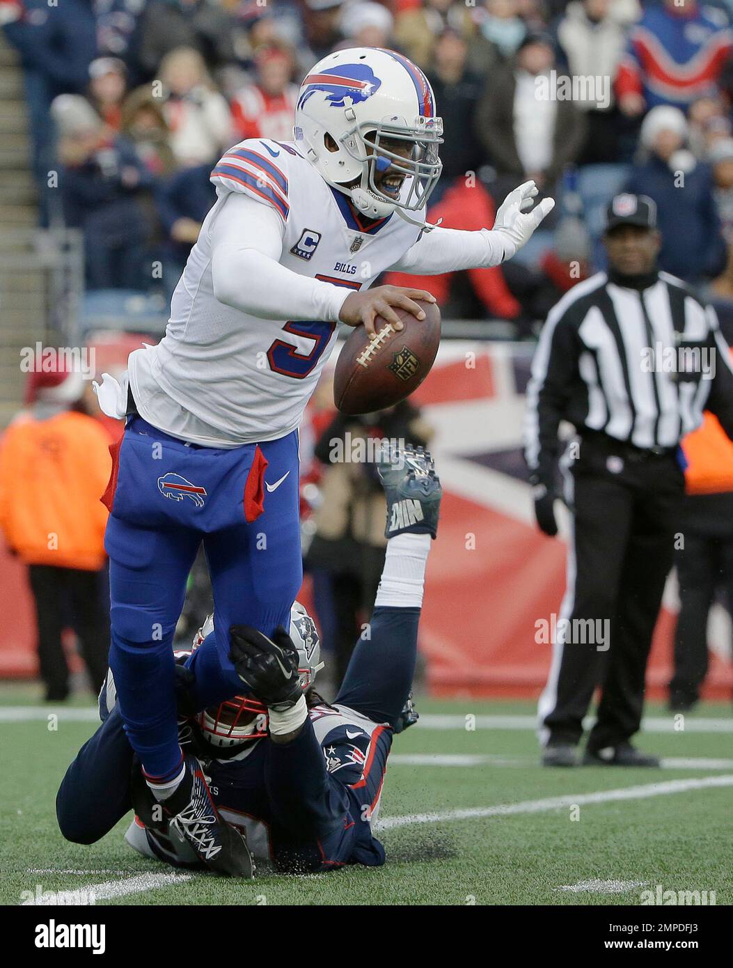 New England Patriots defensive tackle Malcom Brown, rear, sacks Buffalo ...