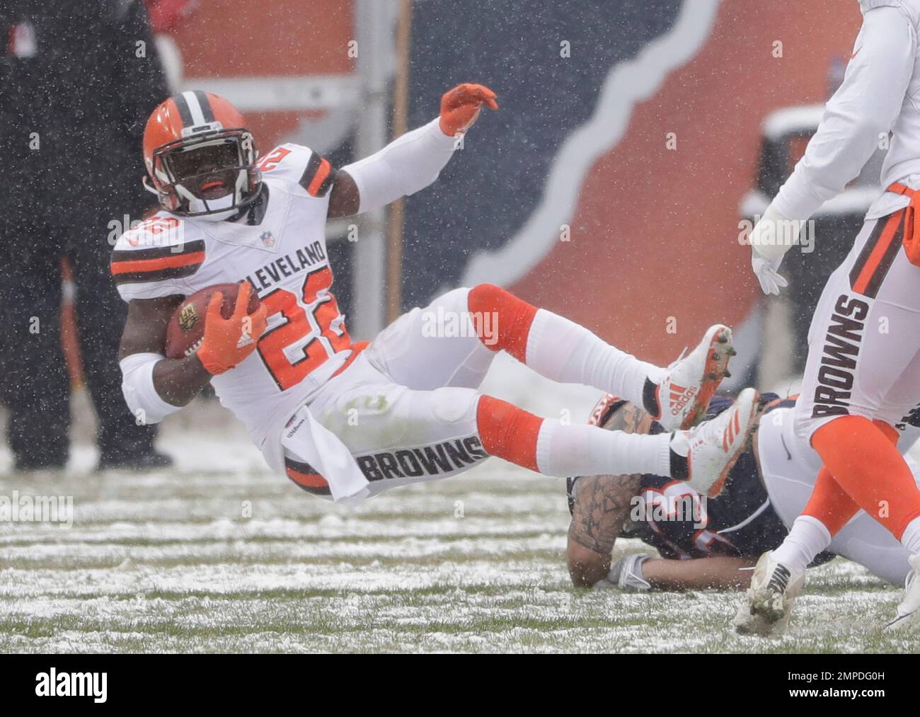 Chicago Bears inside linebacker John Timu (53) tackles Cleveland Browns ...