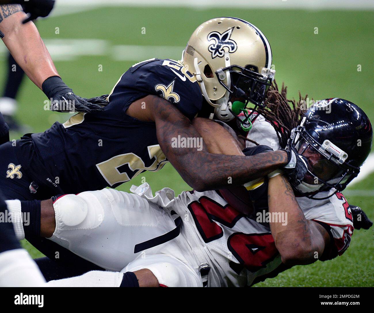 New Orleans Saints cornerback Ken Crawley (20) stops Atlanta Falcons ...