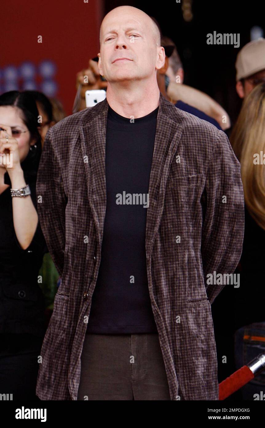 Actor Bruce Willis attends the ceremony honoring Oscar award winning ...