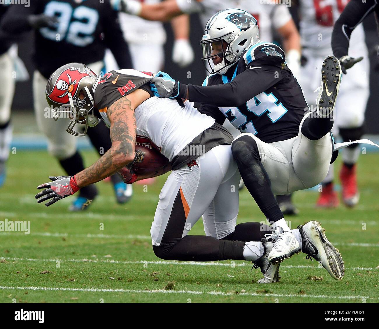 Tampa Bay Buccaneers' Mike Evans (13) is tackled by Carolina Panthers ...