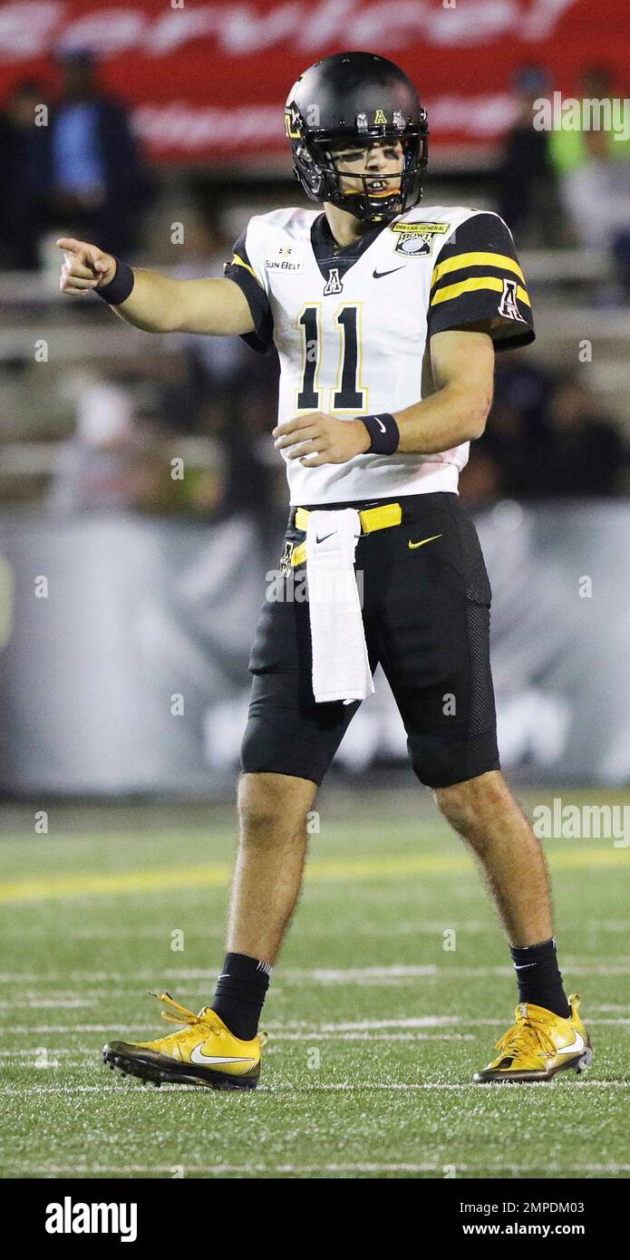 Appalachian State quarterback Taylor Lamb points down field while ...