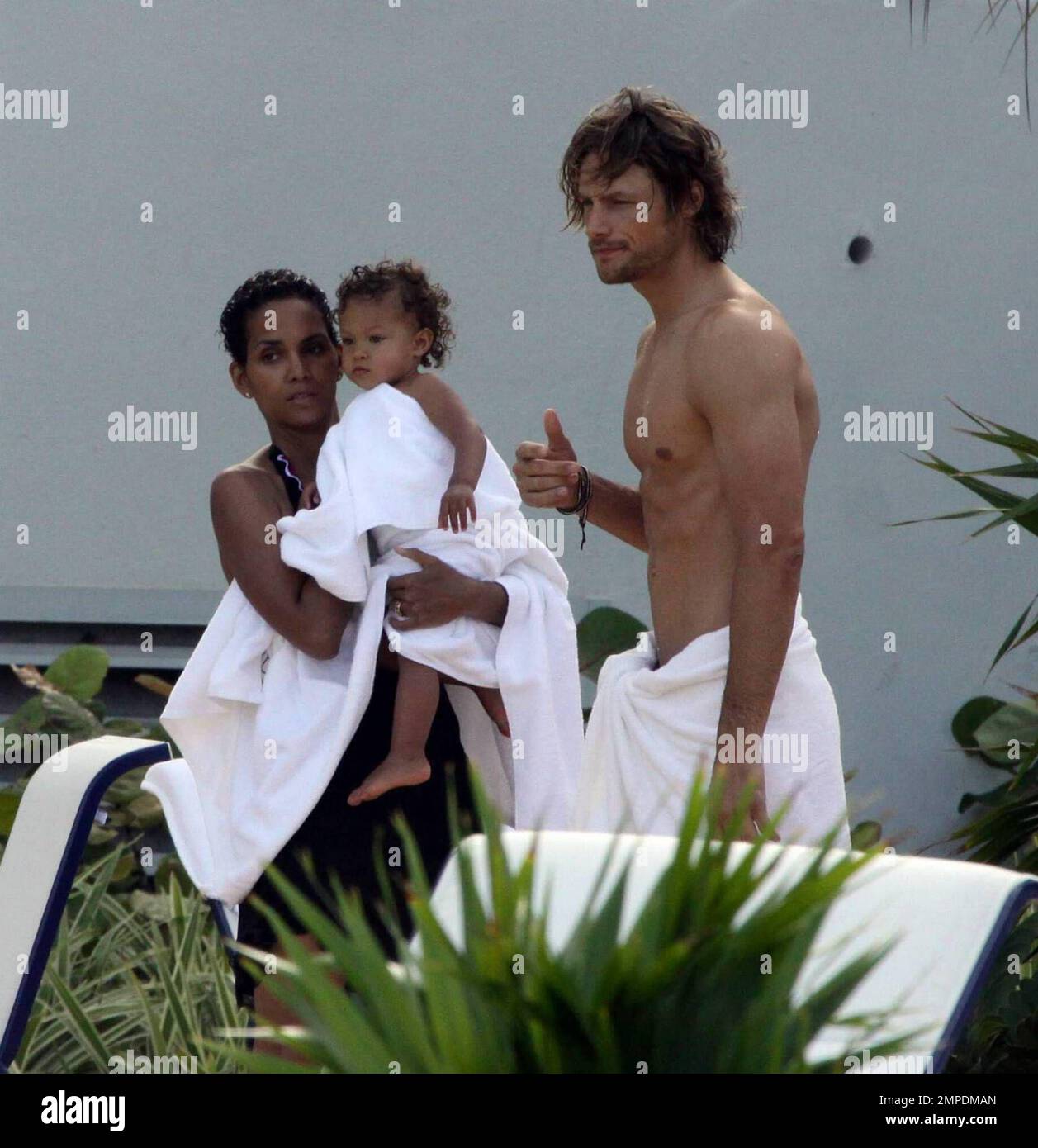 Halle Berry, Gabriel Aubry and their young daughter Nahla spend the afternoon at the pool. Miami ...