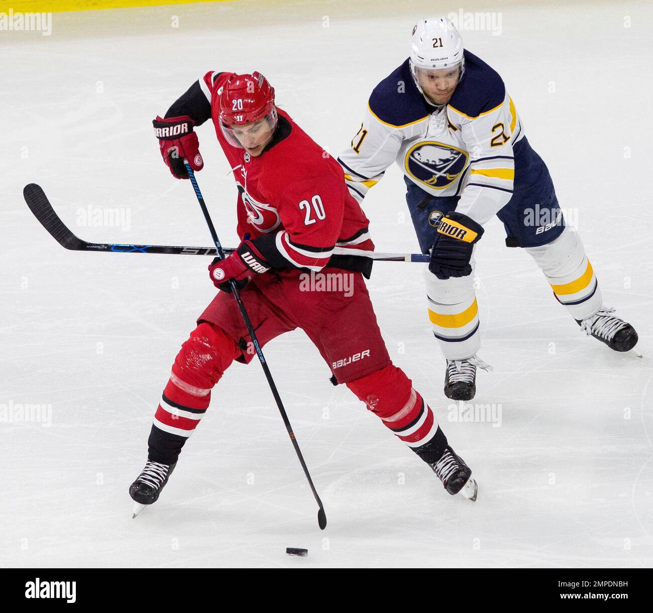 Carolina Hurricanes' Sebastian Aho (20), of Finland, handles the puck ...