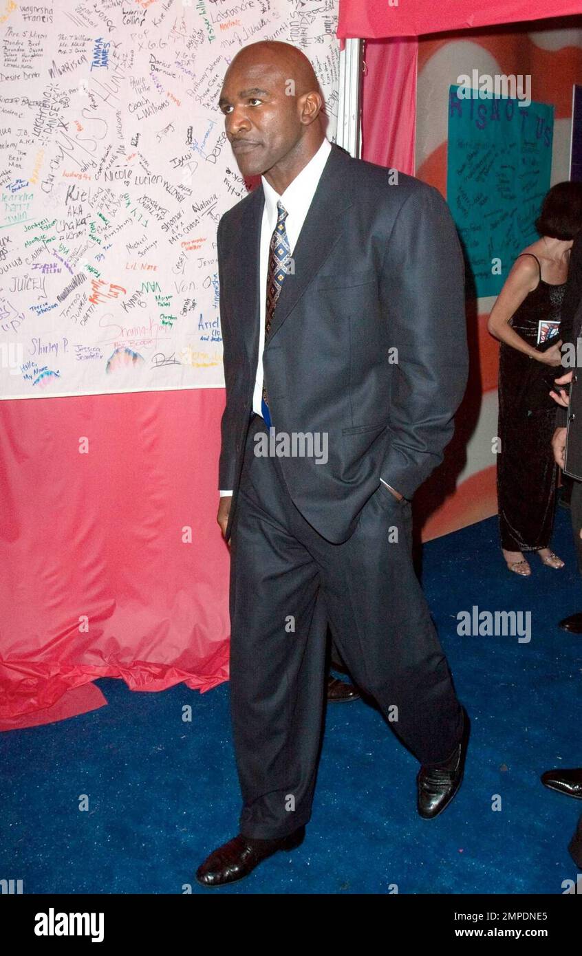 World champion professional boxer, Evander Holyfield, attends the 13th ...