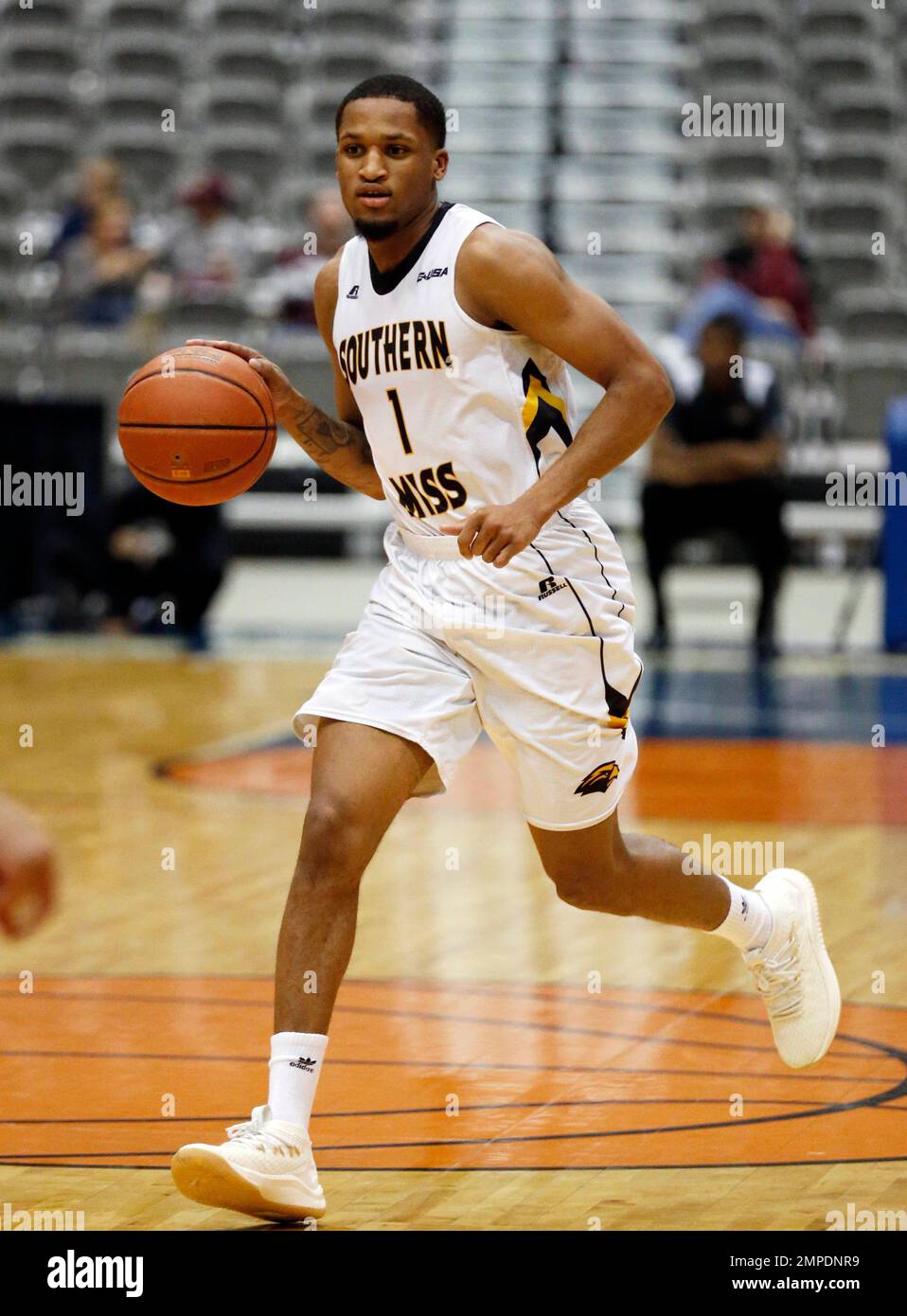 Southern Mississippi guard Cortez Edwards (1) dribbles downcourt ...