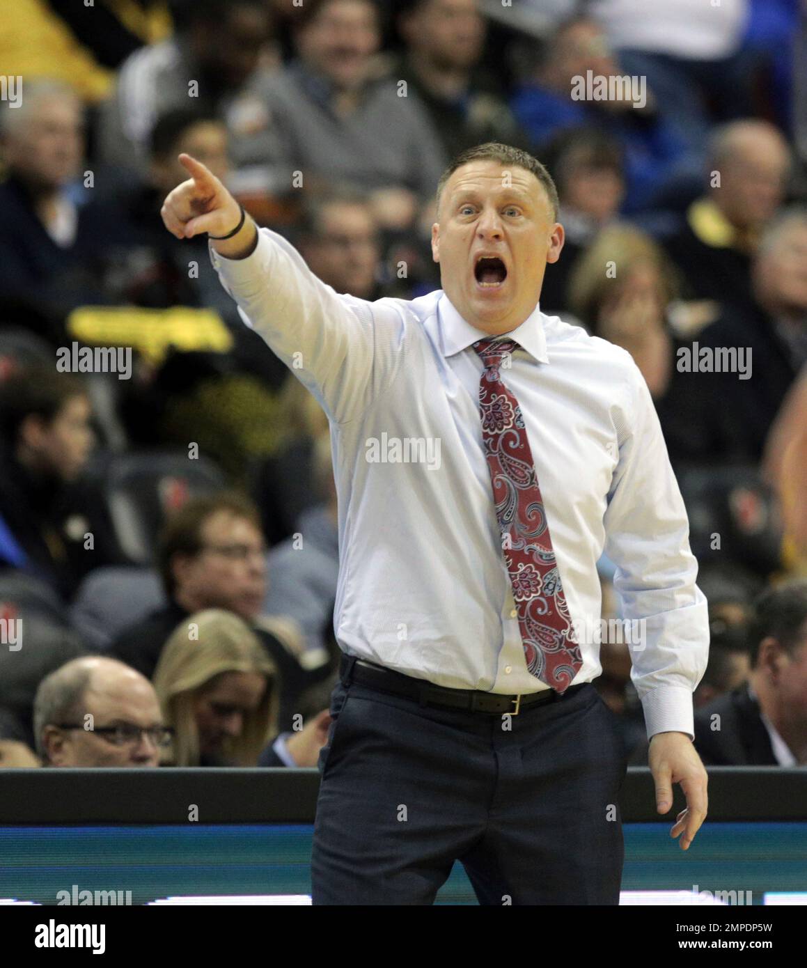 Virginia Commonwealth head coach Mike Rhoades shouts to his players ...