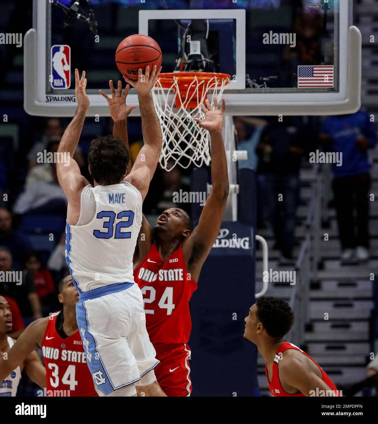North Carolina forward Luke Maye (32) shoots over Ohio State forward ...