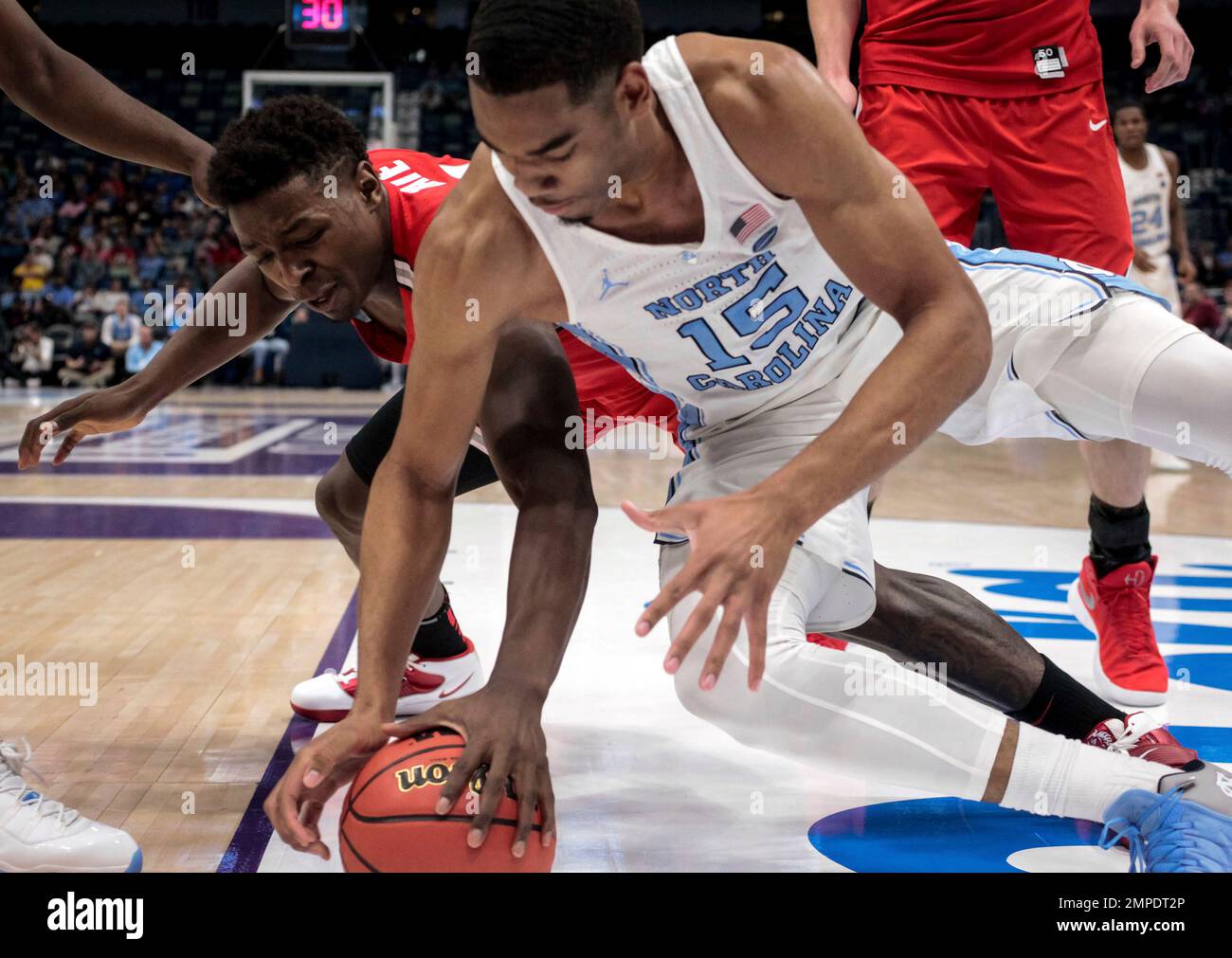 Ohio State forward Jae'Sean Tate (1) and North Carolina forward ...