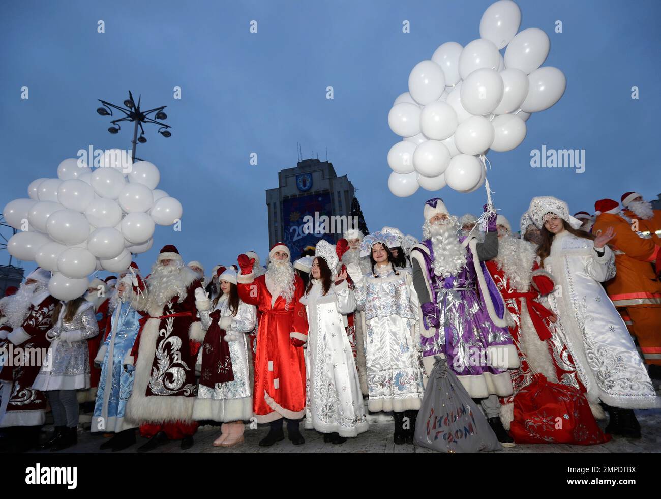 Men dressed as Ded Moroz (Grandfather Frost) and women wearing ...
