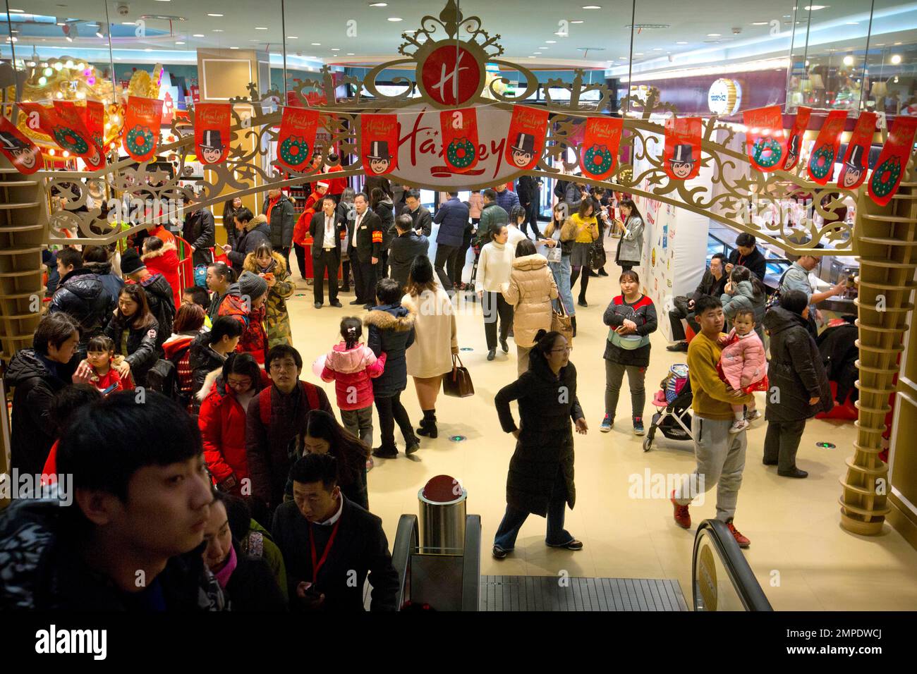 Crowds of Chinese shoppers walk through Hamleys toy store during its ...