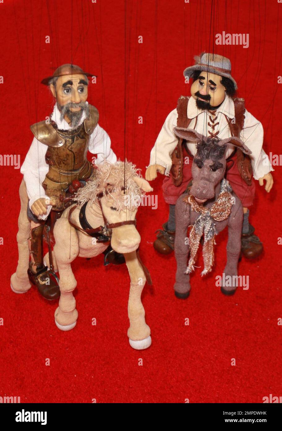 Marionettes from the film "Quixote" are manipulated on the red carpet ...